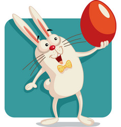 Cute rabbit cartoon holding easter egg Vector Image by tigatelu - Image ...