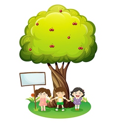 Girls reading under tree Royalty Free Vector Image