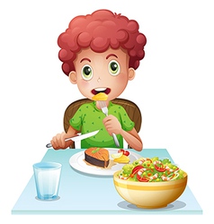 Cartoon little boy eating breakfast Royalty Free Vector