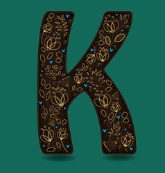 K gold letter with swirly ornaments Royalty Free Vector