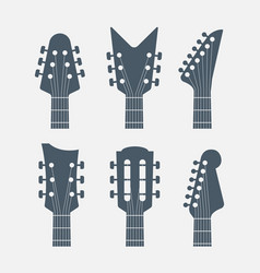 Electric and bass guitar headstock silhouettes Vector Image