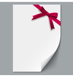 Realistic red bow with ribbon isolated on black Vector Image